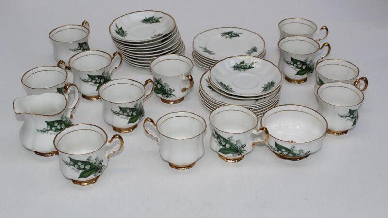 A mid 20th century Lubern China part tea service, decorated with Lily ...