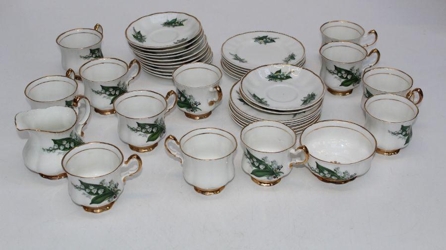 A mid 20th century Lubern China part tea service, decorated with Lily ...
