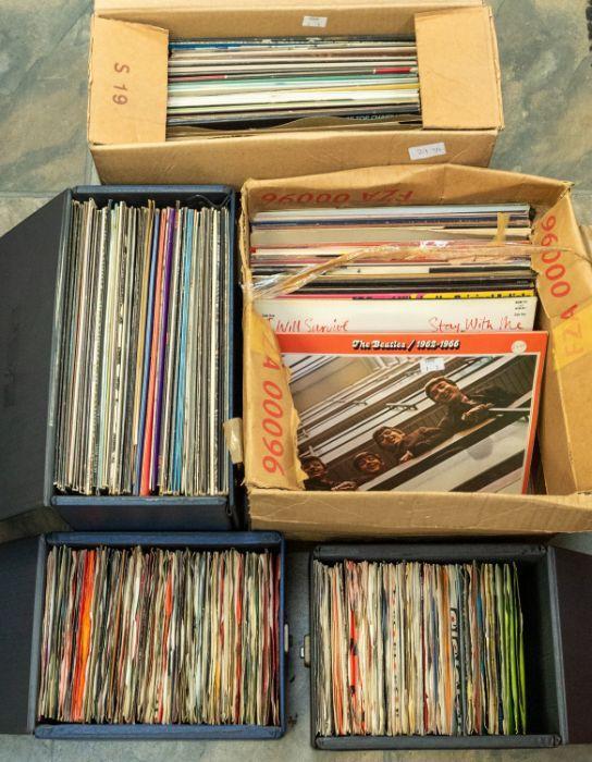 5 x boxes of LP and 7 inch records. Two x small 7 inch cases comprising ...