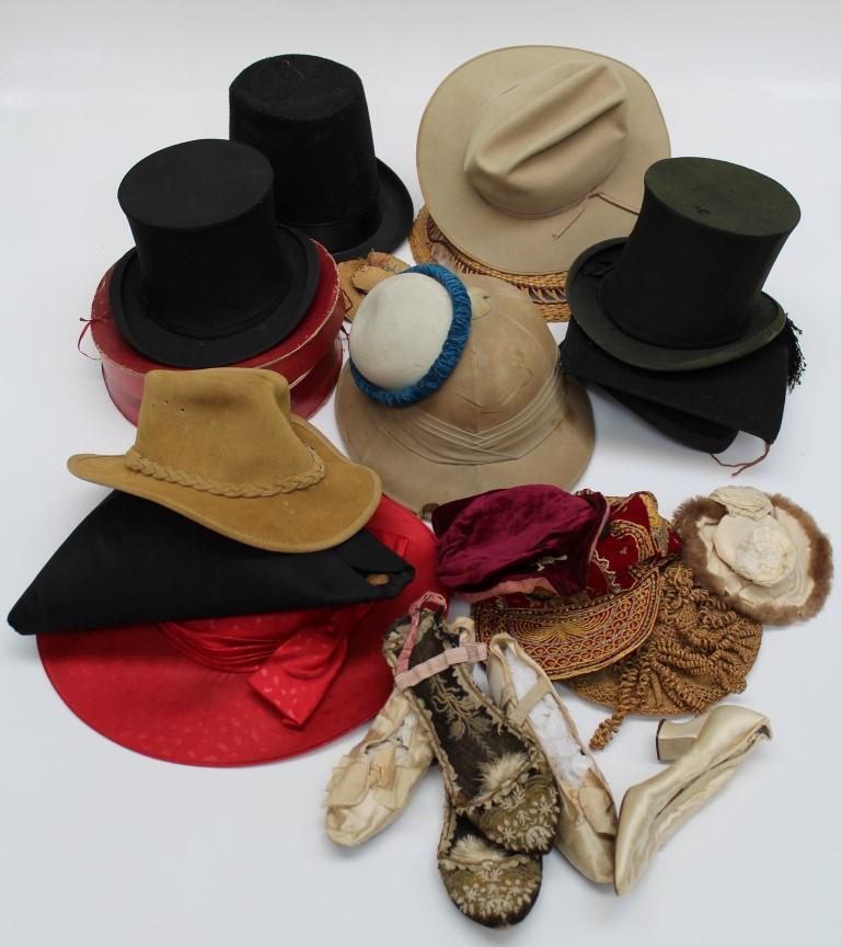 An early 20th century black opera hat, together with a pith helmet, bi ...
