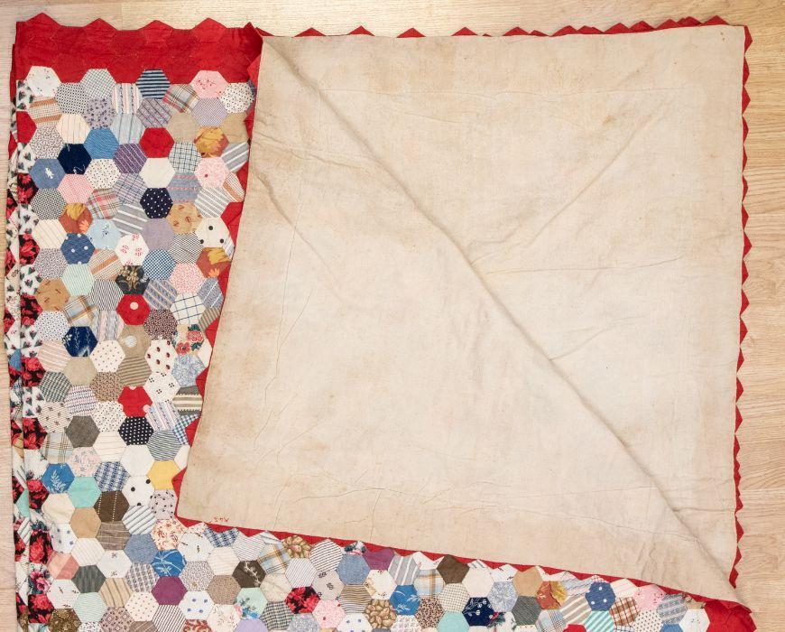A large Victorian patchwork quilt, fine example with hexagonal panels ...