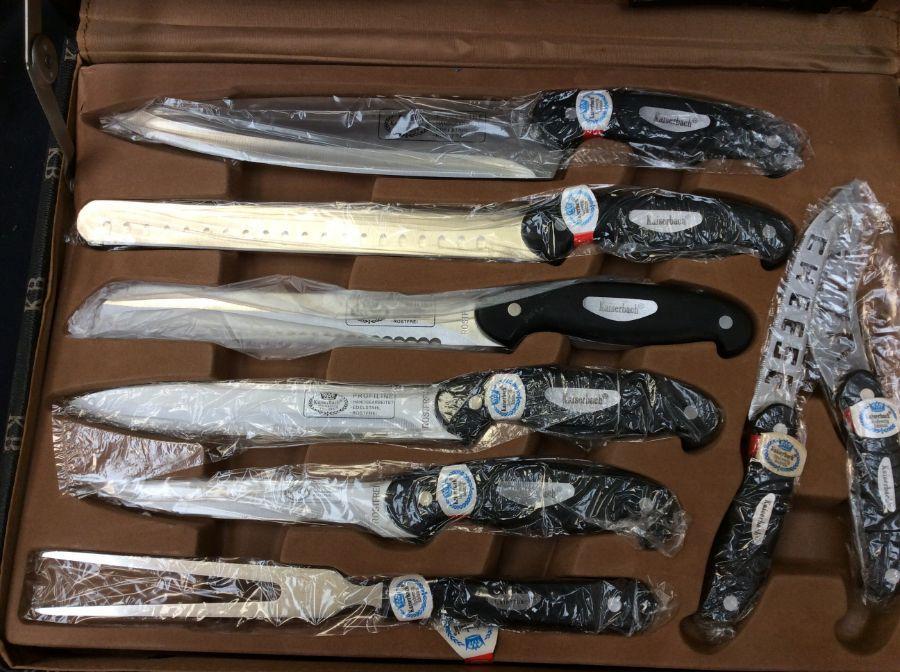 A complete set of chef's knives by Kaiserbach in a brief case