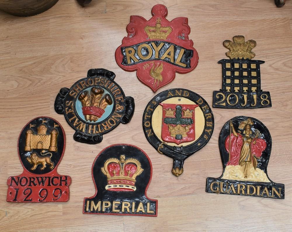 A group of seven lead fire plaques including Notts and Derbys, Royal ...