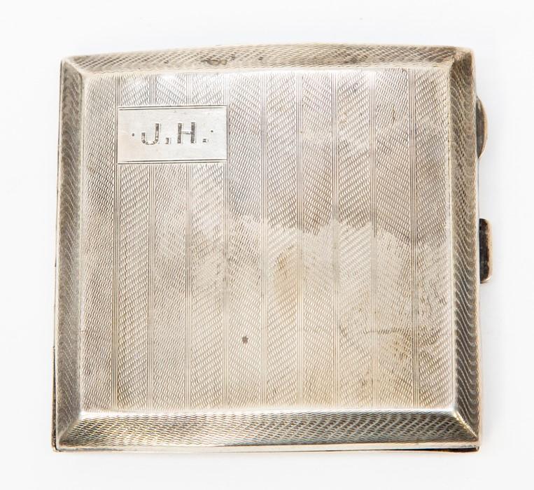 A George V silver cigarette case, striated engraved decoration by Frederick Field, Birmingham ...