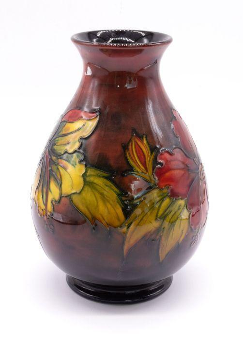 Moorcroft Pottery: A Moorcroft flambe 'Hibiscus' pattern baluster vase ...