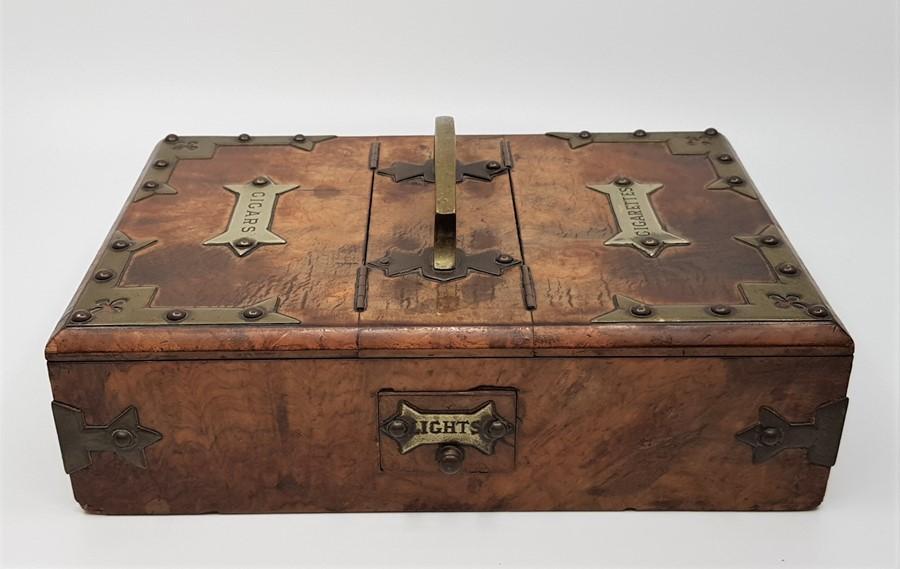 An early 20th century brass mounted burr walnut combination cigarette ...