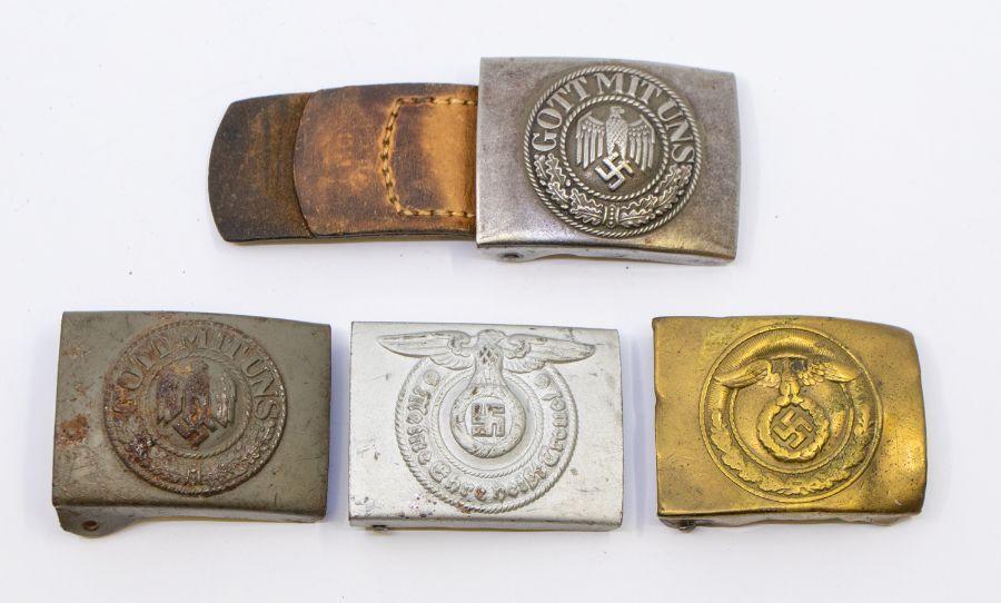 4 x WWII era German belt buckles, to include: a German army buckle ...