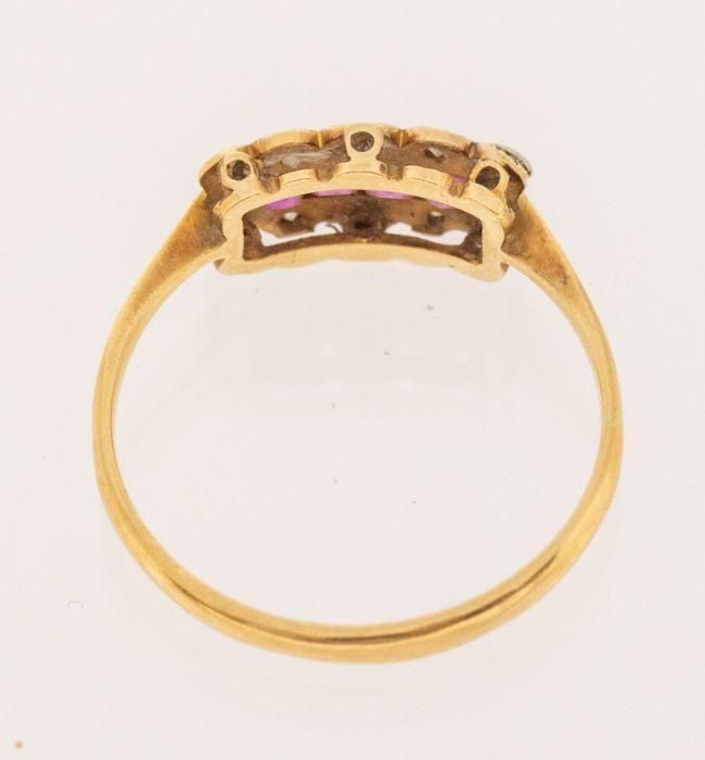 An early 20th century ruby and diamond dress ring. Stamped 18ct Plat to ...