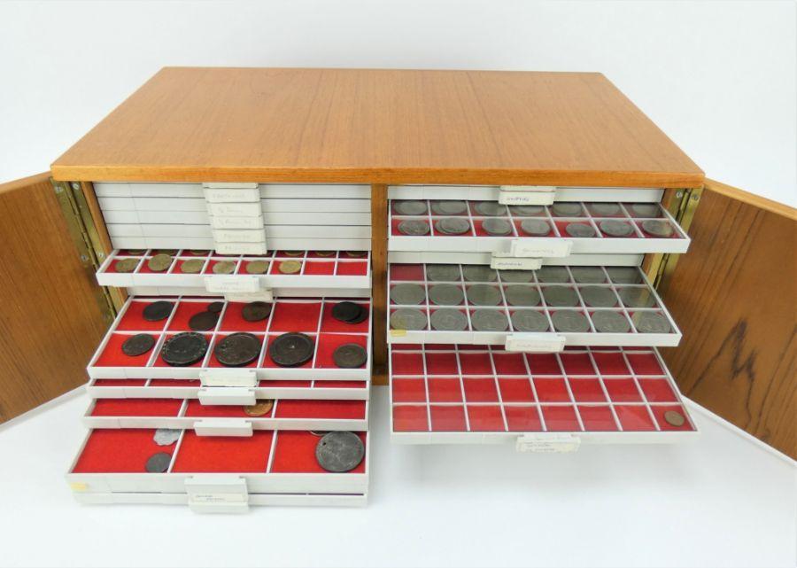 A 32 drawer Lembit teak coin collectors cabinet with key. All drawers ...
