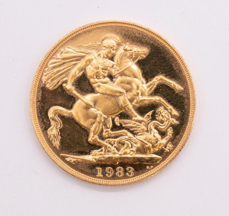 A 1983 two pound coin, weight approx 16gms along with a 9ct gold mount ...