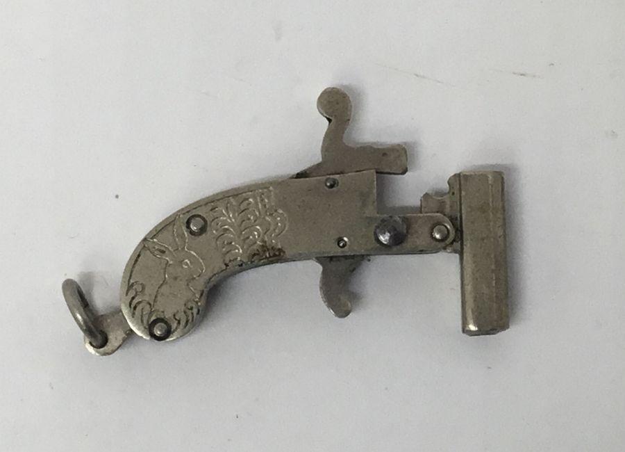 An unusual pair of miniature Berloque percussion pistols, likely of ...