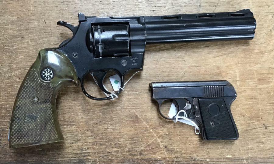 Two Realistic full size Replica hand guns, one Magnum style revolver ...