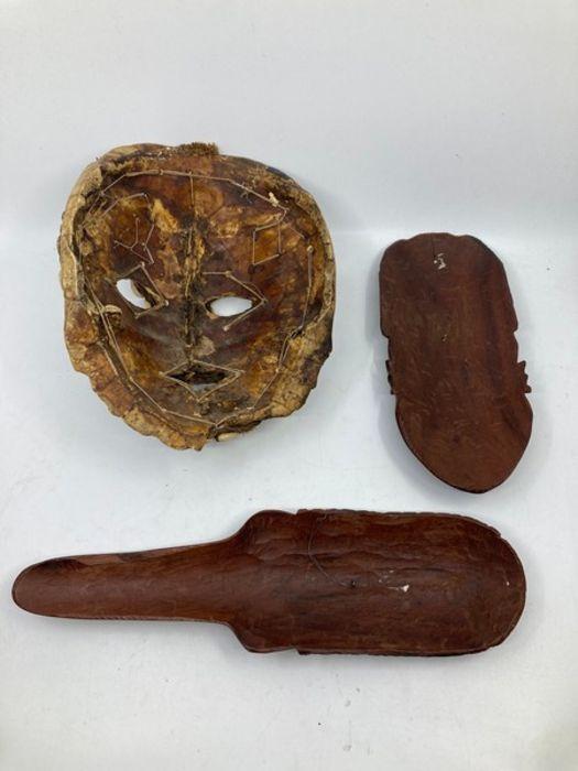 Ethnigraphica, Three African Tribal Masks, two carved from hardwood ...