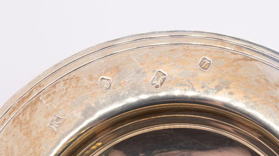 A Modern silver small dish, convex central section, banded border ...