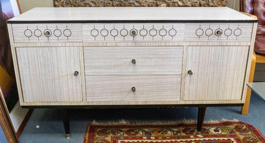 A Berry Furniture melamine sideboard, with a stylised design on ...