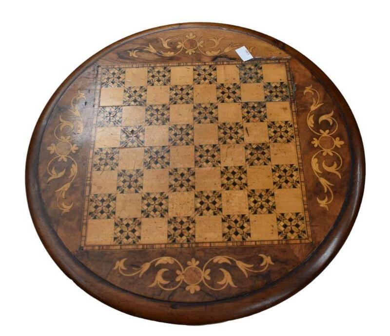 A circular, chess-board inlaid, pedestal sewing table
