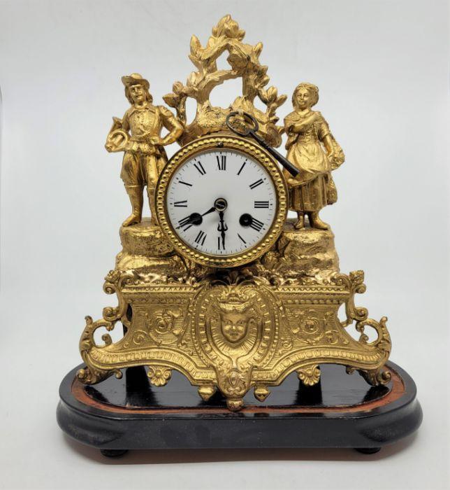 A 19th century style French gilt metal mantle clock, bell strike ...