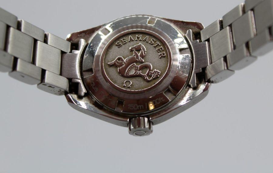An Omega Seamaster Aqua Terra, circa 2008. Black sunburst dial and ...