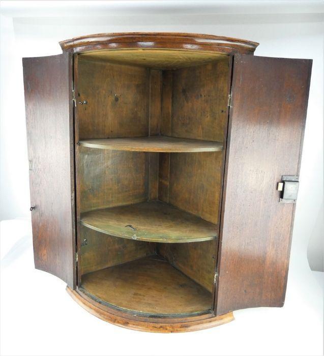 Early 19th century oak barrel fronted corner cupboard with brass mounts ...