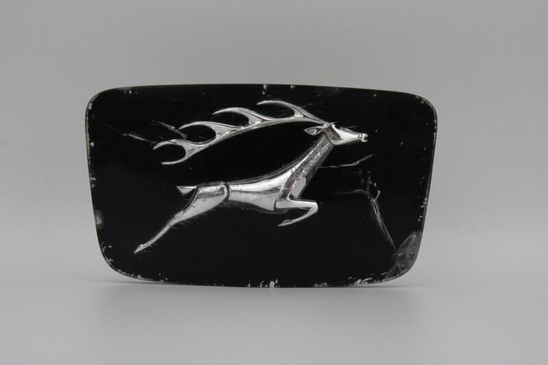 An original Triumph Stag nose badge