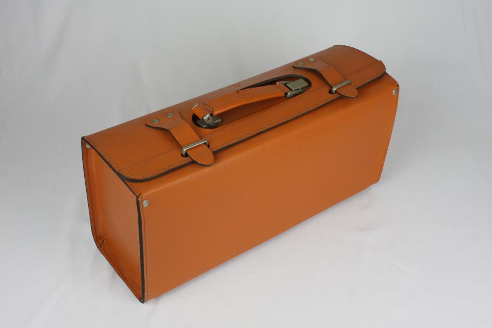 A leather cased car care kit for Ferrari by Schedoni