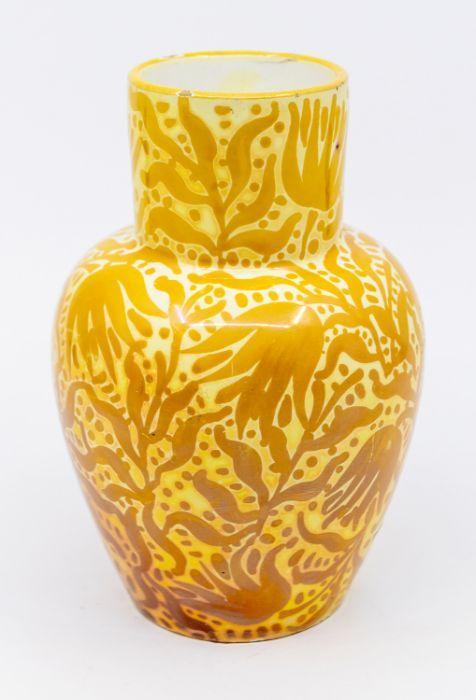 Clement Massier - A floral and foliage designed vase in graduating ...