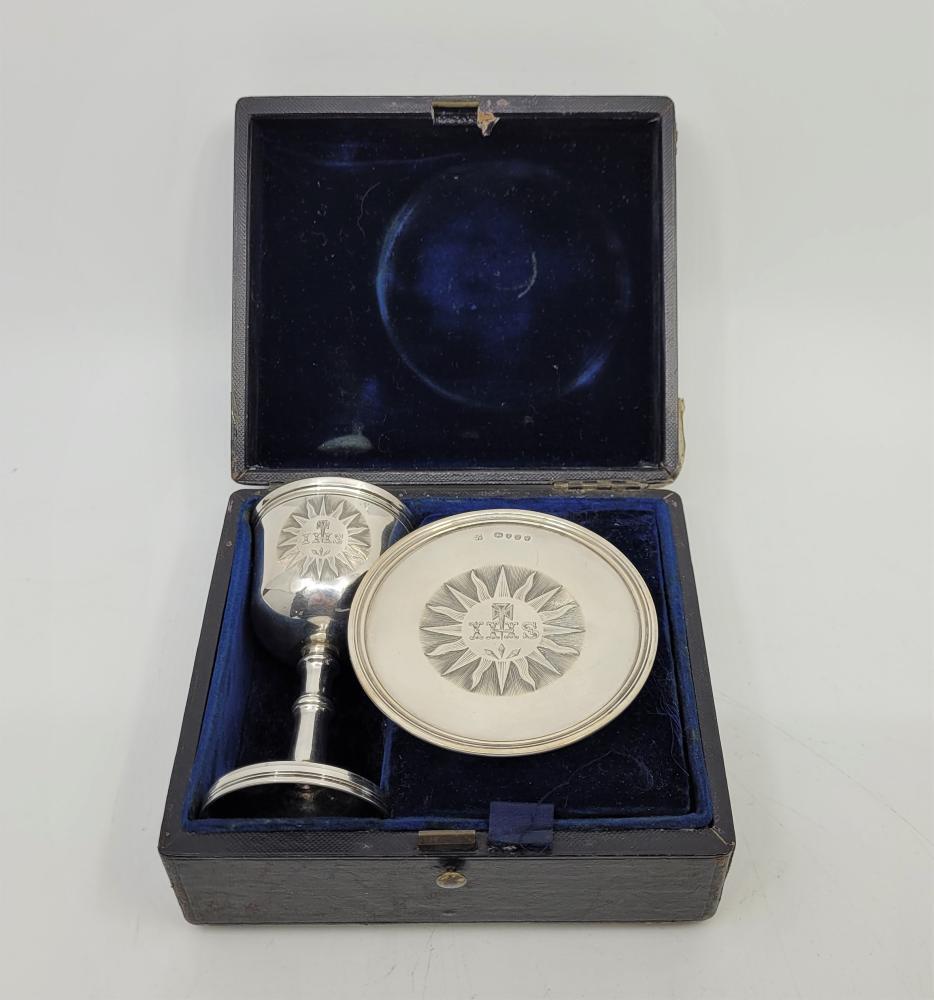 A Victorian silver travelling communion chalice, paton and flask set ...