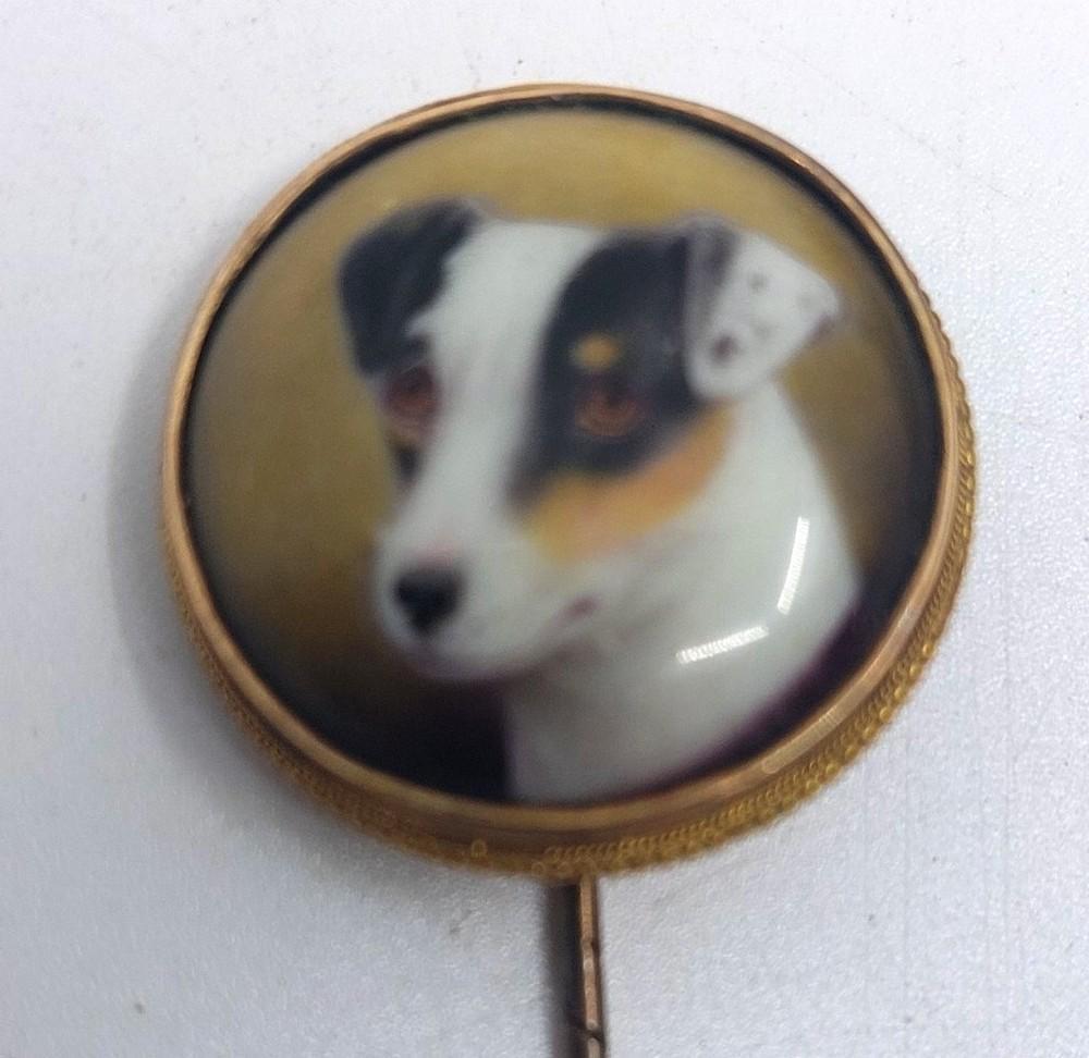 A Victorian porcelain tie pin painted with the head of a terrier, in ...