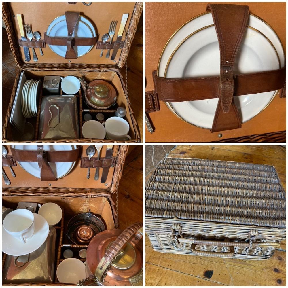 A vintage wicker picnic set containing a copper and brass spirit kettle ...