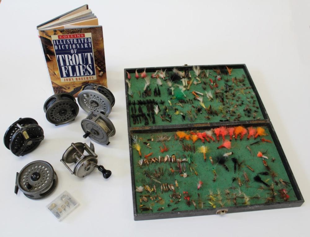 A Rimfly Intrepid fly reel, a Mohawk reel, a Berkley 558 reel and three ...