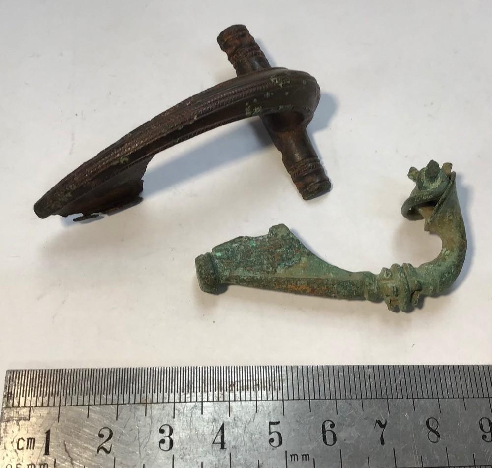 Two Roman Brooches, Decorated sprung “dolphin” Roman fibular brooch ...
