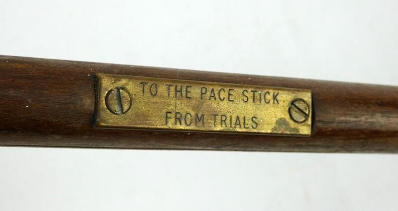 A George Potter & Co military parade ground pace stick. Mahogany with ...