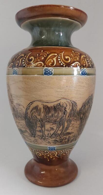 A Tall Doulton Lambeth vase by Hannah Barlow, standing 29cm high. Back stamped Doulton Lambeth ...