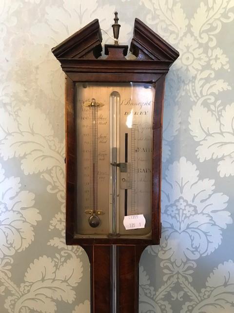 A 19th Century mahogany and strung mercury stick barometer, broken ...