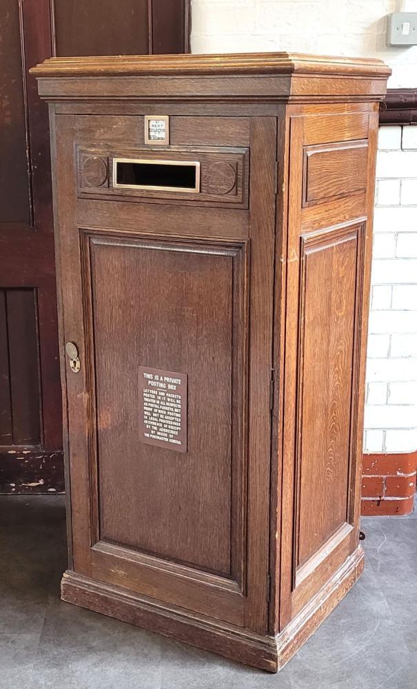 A very large Edwardian oak hall post box, having rectangular moulded ...