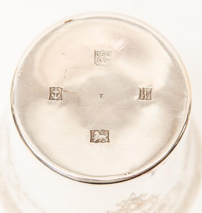 An Elizabeth II silver beaker, flared rim the body engraved with ...