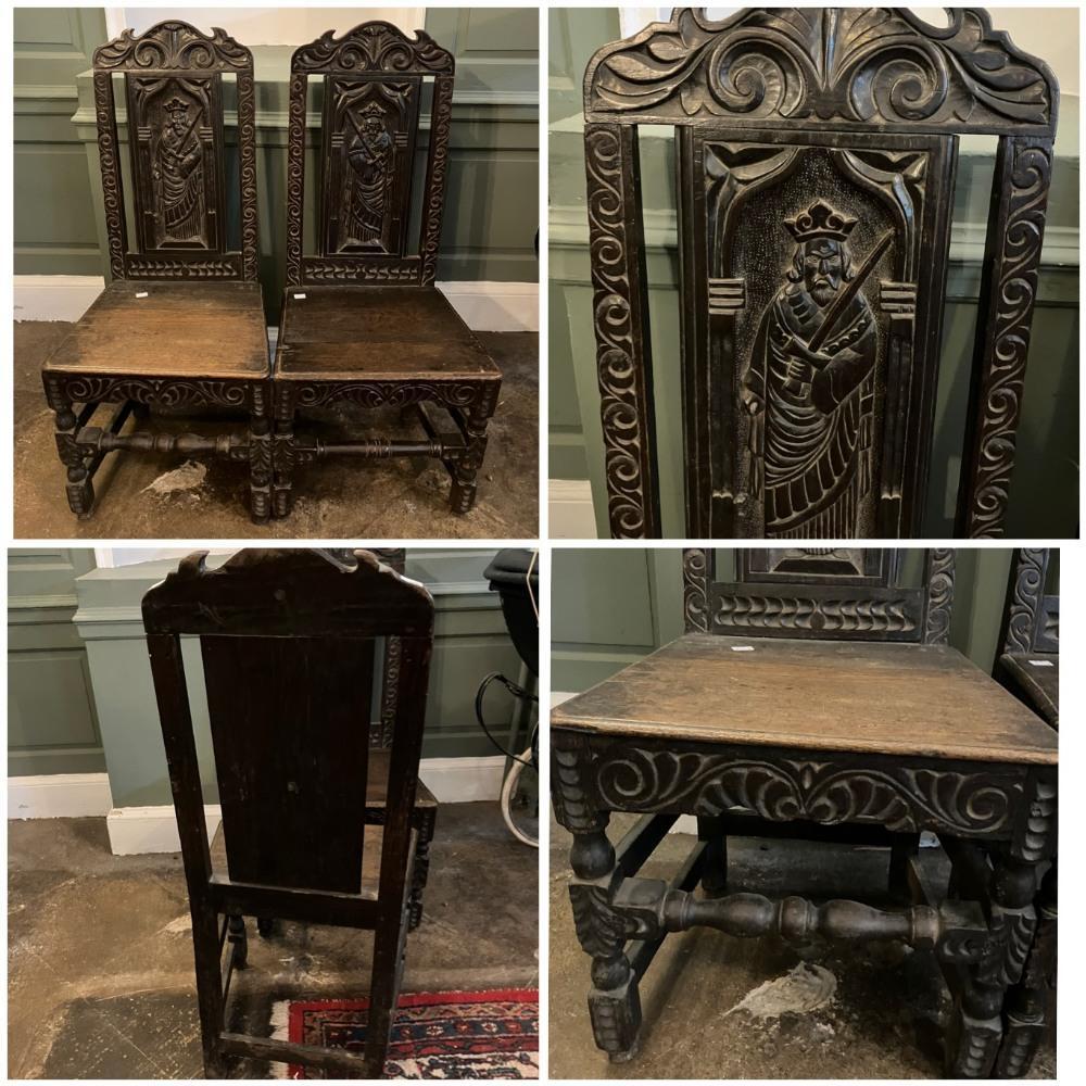 Pair of opposing carved oak hall chairs Foliate scrolling top rail ...