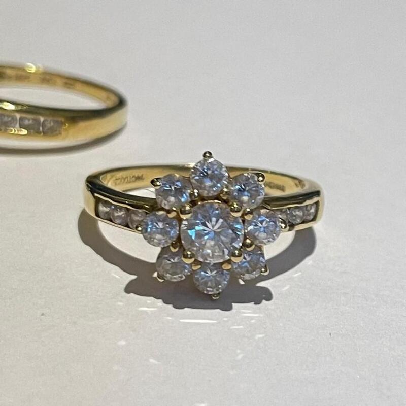 Two 14ct yellow gold Cubic Zirconia set rings. Both size P. Gross ...