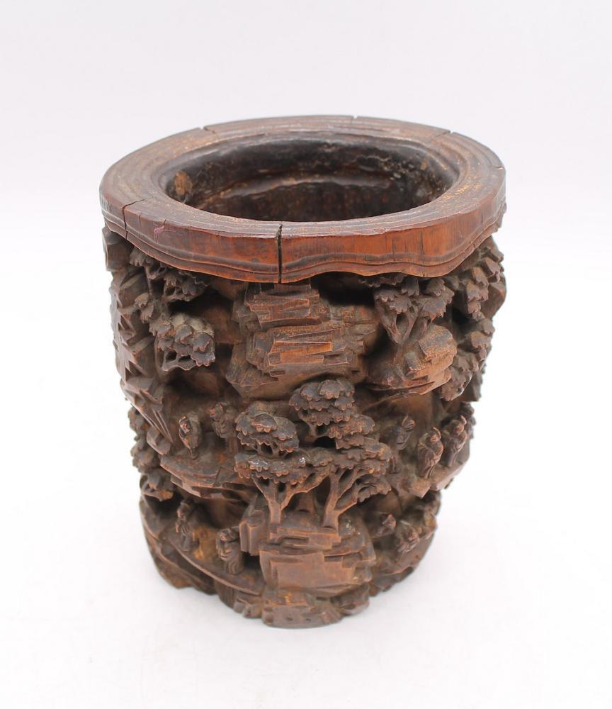 A 19th century Chinese brush pot with carved chinoiseries and pagoda ...