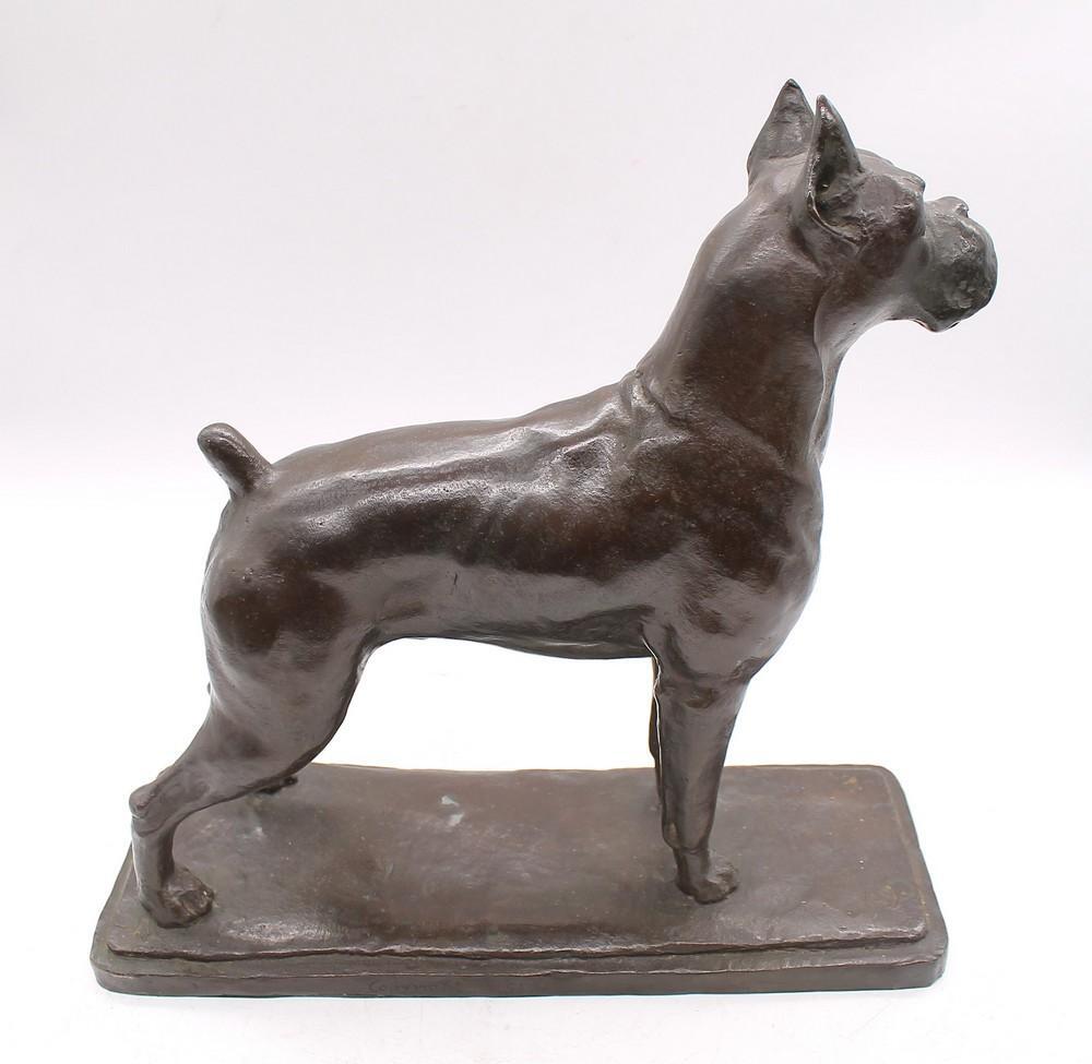 A bronze sculpture of a boxer dog, standing proudly, well cast and ...