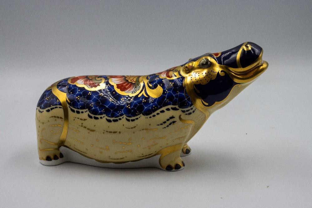 Royal Crown Derby - A boxed gold stopper Hippopotamus paperweight.