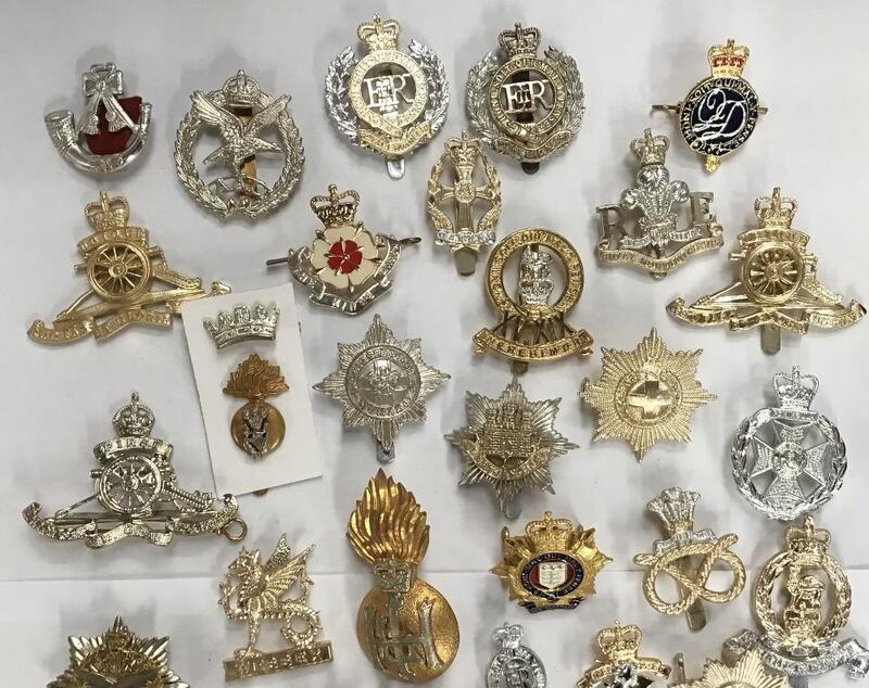 Collection of British Military Cap Badges of different regiments and ...