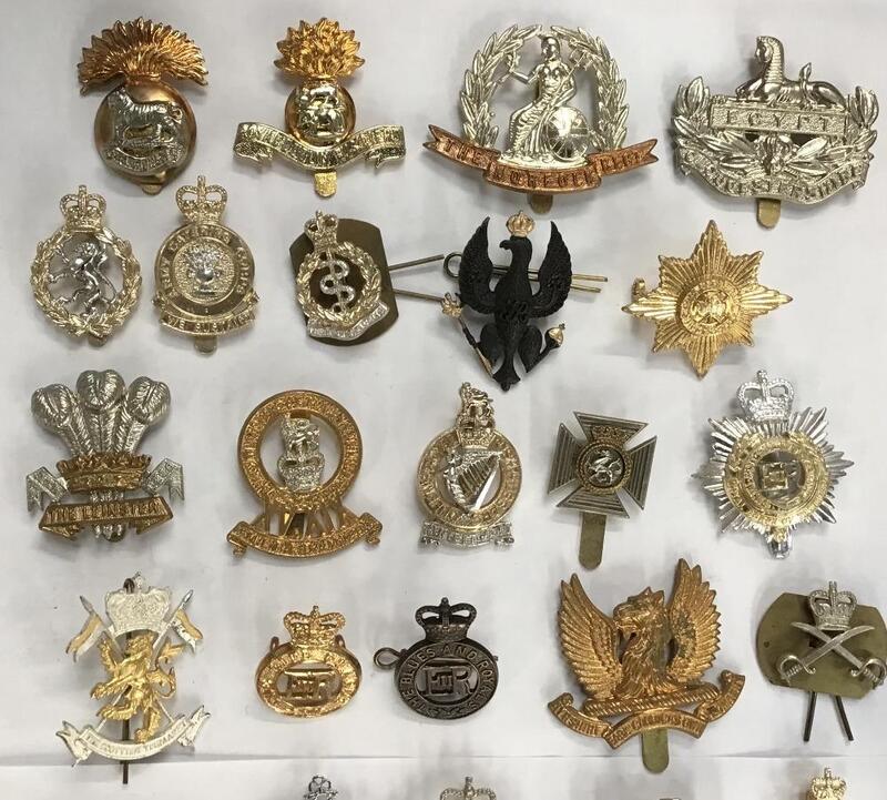 Collection of British Military Cap Badges of different regiments and ...