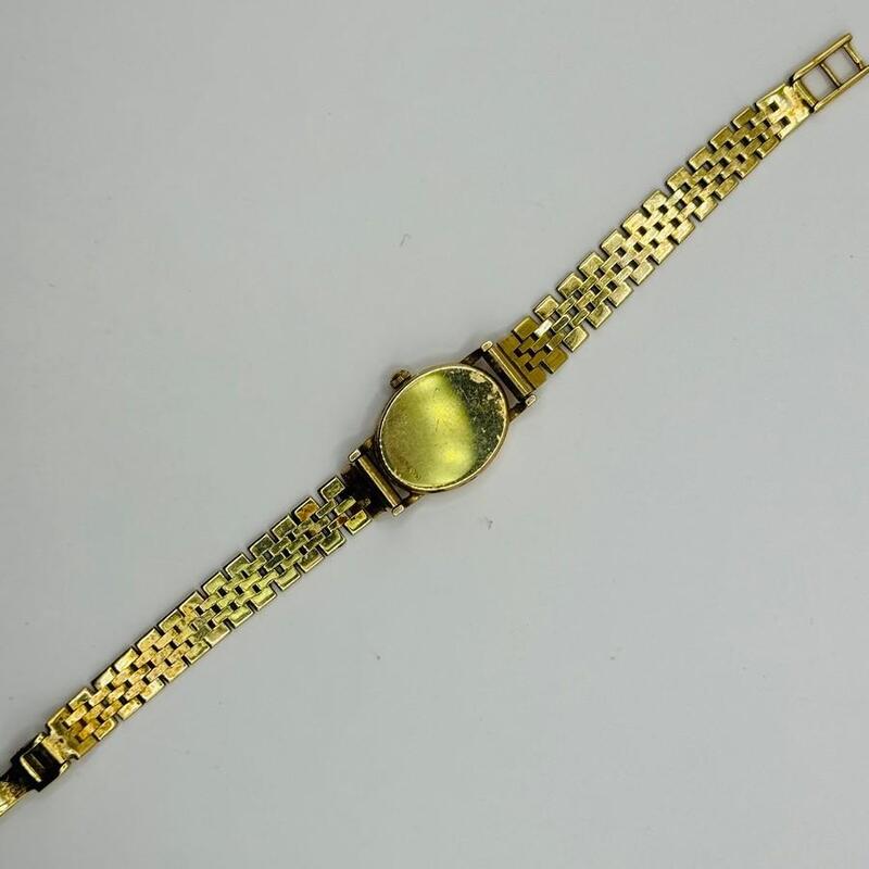A ladies 9ct yellow gold WHW signed watch on a precious yellow metal ...