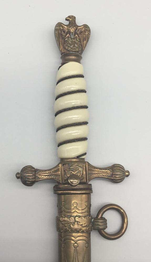 A WW2 German Kriegsmarine officer's dagger, by F.W.Holler, Solingen ...