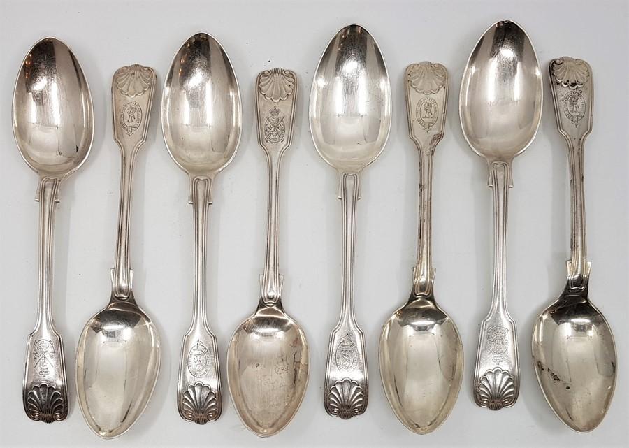A set of eight silver fiddle thread and shell pattern dessert spoons ...