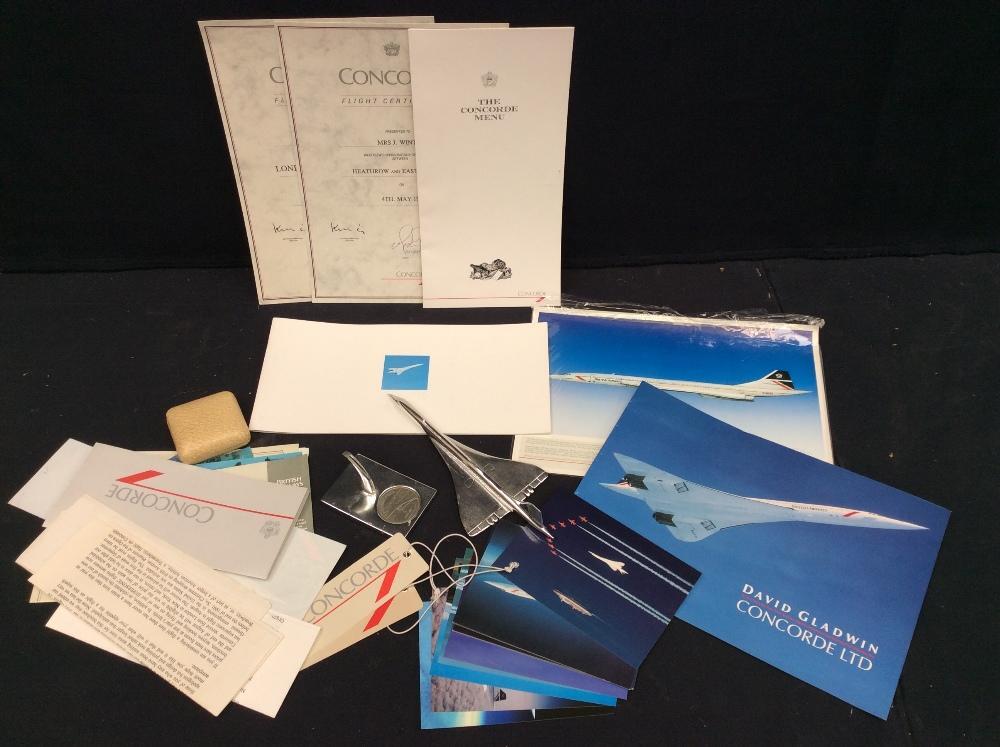 A collection of mixed Concorde memorabilia to include; a Royal Mint ...