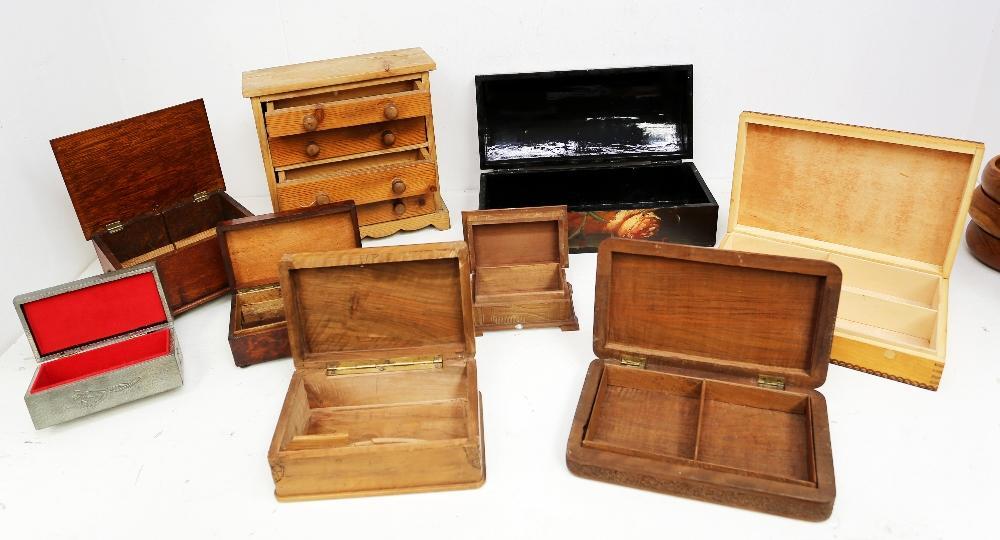 A collection of 20th Century treen boxes with treen bowls.