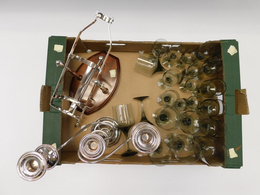 A collection of graduated green glass modern drink glasses along with ...