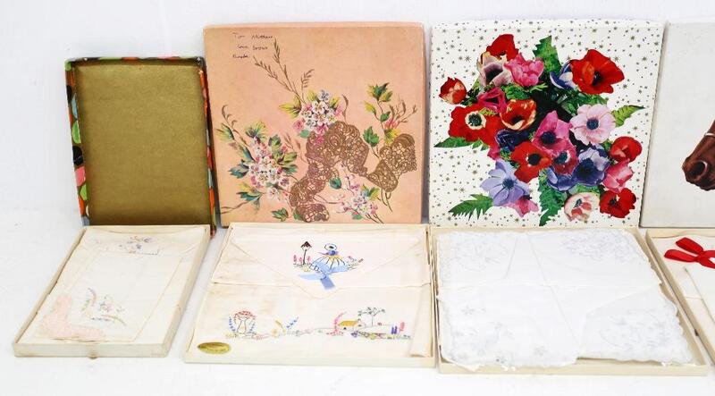 A collection comprising: an engine-turned early 1950s compact; an ...